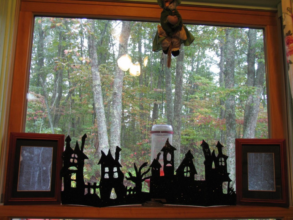 Ghost pictures printed on velum paper for Halloween decor.